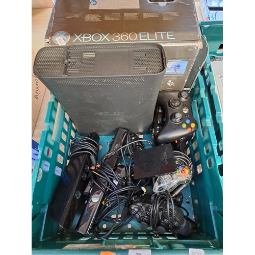 A collection of Microsoft Xbox 360 items to include two consoles - one ...