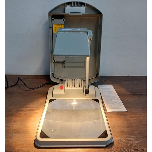 An Elite Tutor TDL overhead projector with power cable and instruction ...