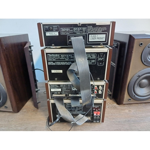 A Technics four piece stereo hi-fi system comprising SL-HD60 CD player ...