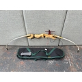 A Selector International Corp archery bow with Opechee carry bag