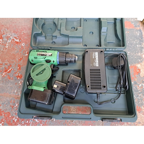 A collection of tools to include cased Hitachi cordless drill with two ...