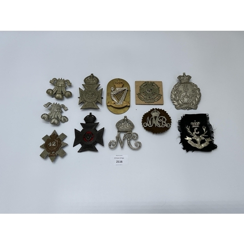 A collection of military cap badges
