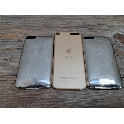 Three Apple items, one 6th generation iPhone A1574 and two 3rd generation iPods A1288