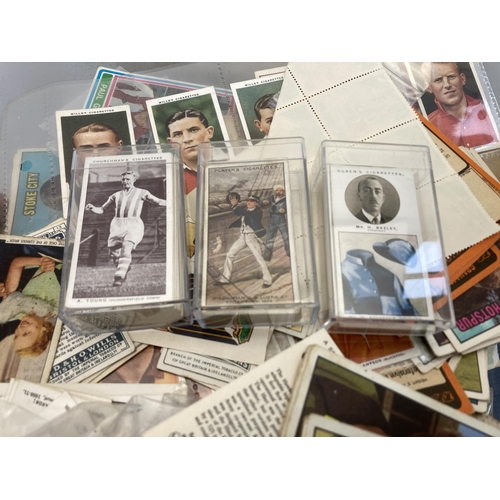 A large collection of vintage collectors cards to include cigarette ...