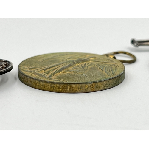 Four WWI British items, one medal trio presented to 4598 Pte. J. Dunne ...