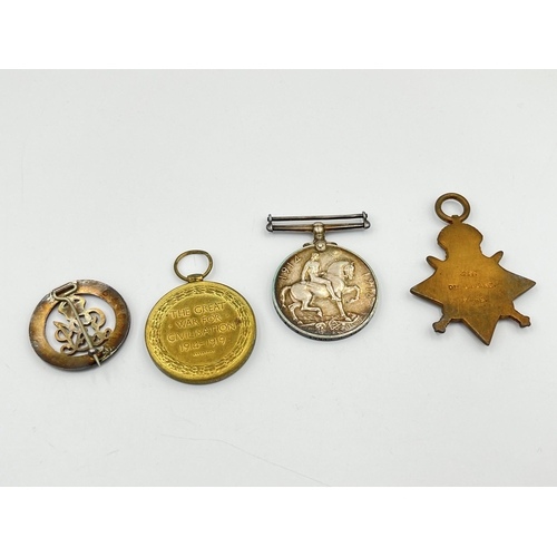 Four WWI British items, one medal trio presented to 4598 Pte. J. Dunne ...