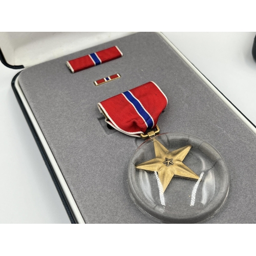 Three boxed USA medals, one Nasa Exceptional Service, one U.S. Air ...