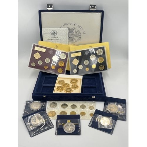 A cased collection of Russian proof coins to include cased 1983 and ...