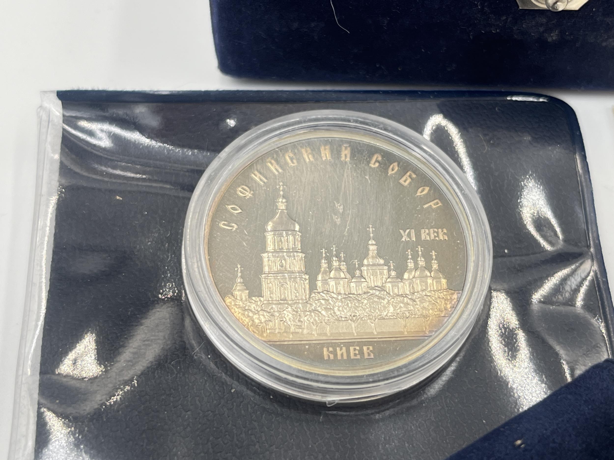 A cased collection of Russian proof coins to include cased 1983 and ...
