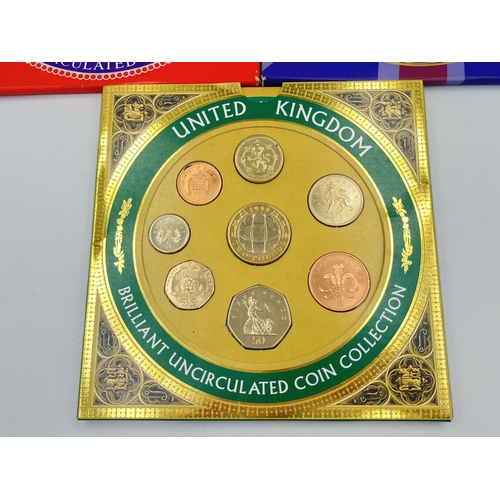 Three packaged United Kingdom brilliant uncirculated coin sets, 1997 ...