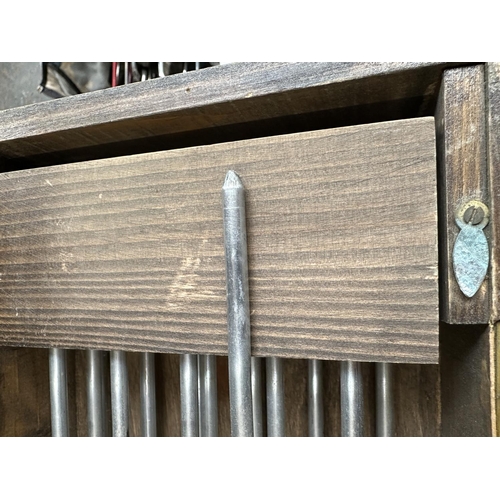 A Selector archery bow with arrows and accessories