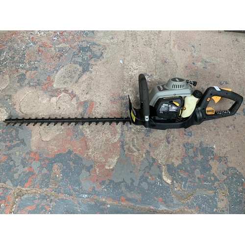 A Titan TTL688-HDC petrol hedge cutter