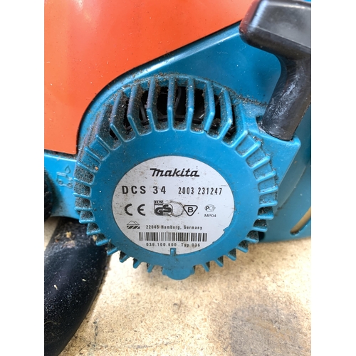 A Makita DCS 34 petrol chainsaw