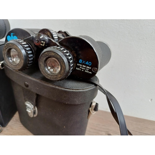 Two cased pairs of extra wide angle binoculars, one Mark Scheffel de ...
