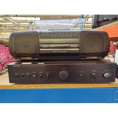 Three items, one Rotel RA-930AX integrated amplifier, one Panasonic RX ...