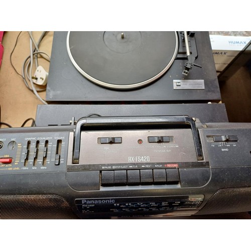 Three items, one Rotel RA-930AX integrated amplifier, one Panasonic RX ...