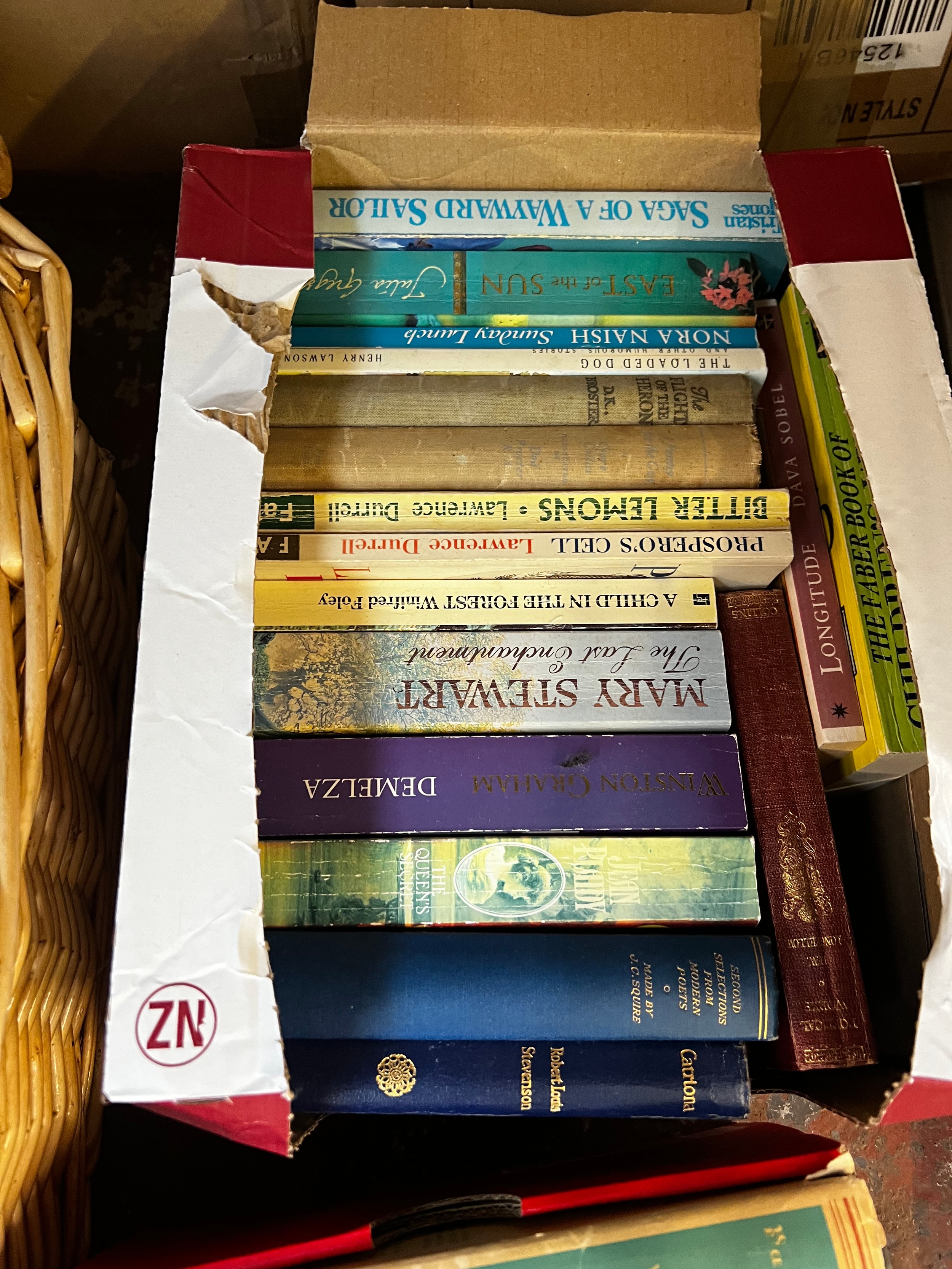 Three boxes and one basket containing novels to include Rudyard Kipling ...