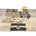 A collection of militaria to include buttons, British Merchant Navy ...