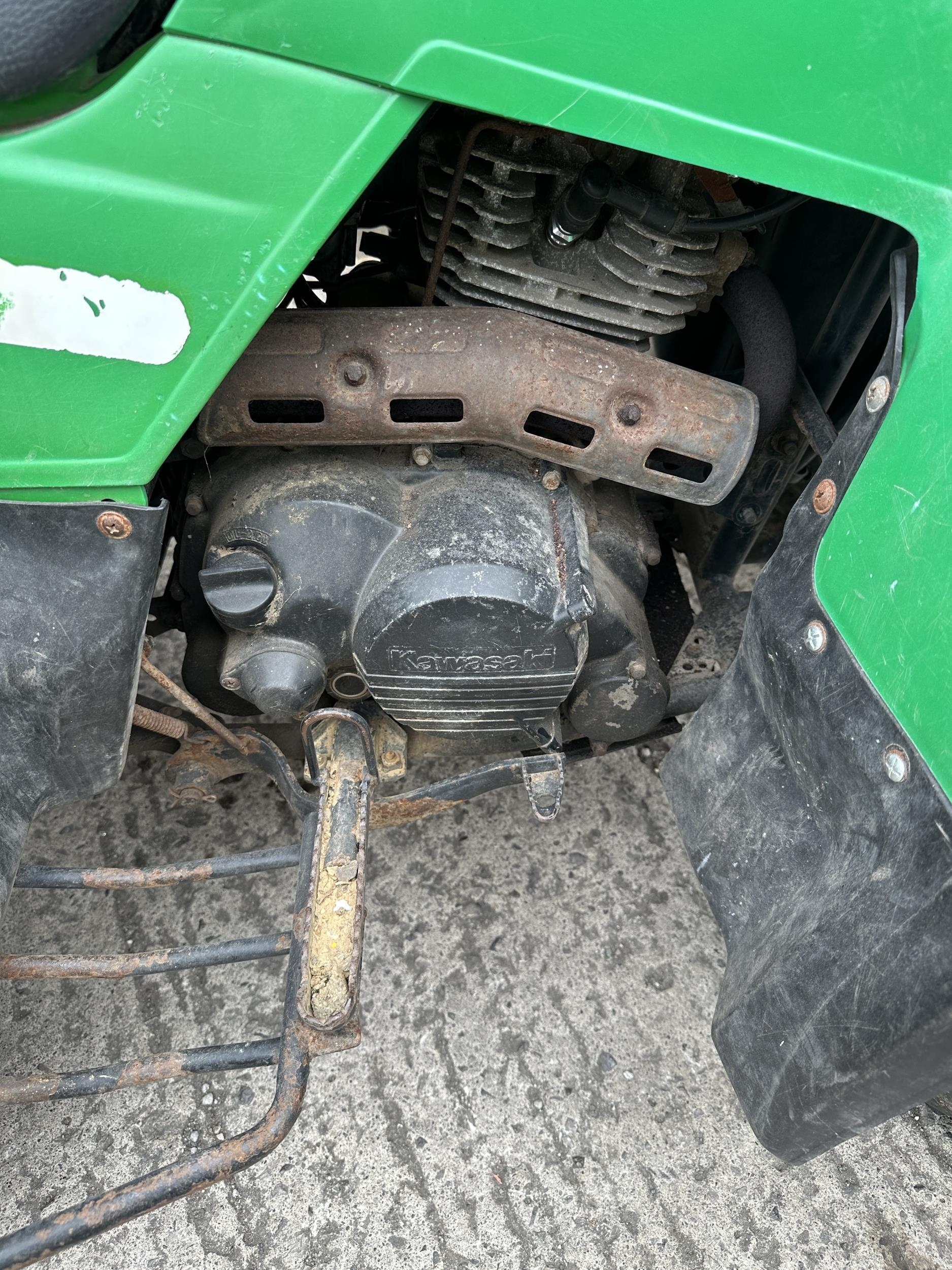 A Kawasaki KLF 220 quad bike