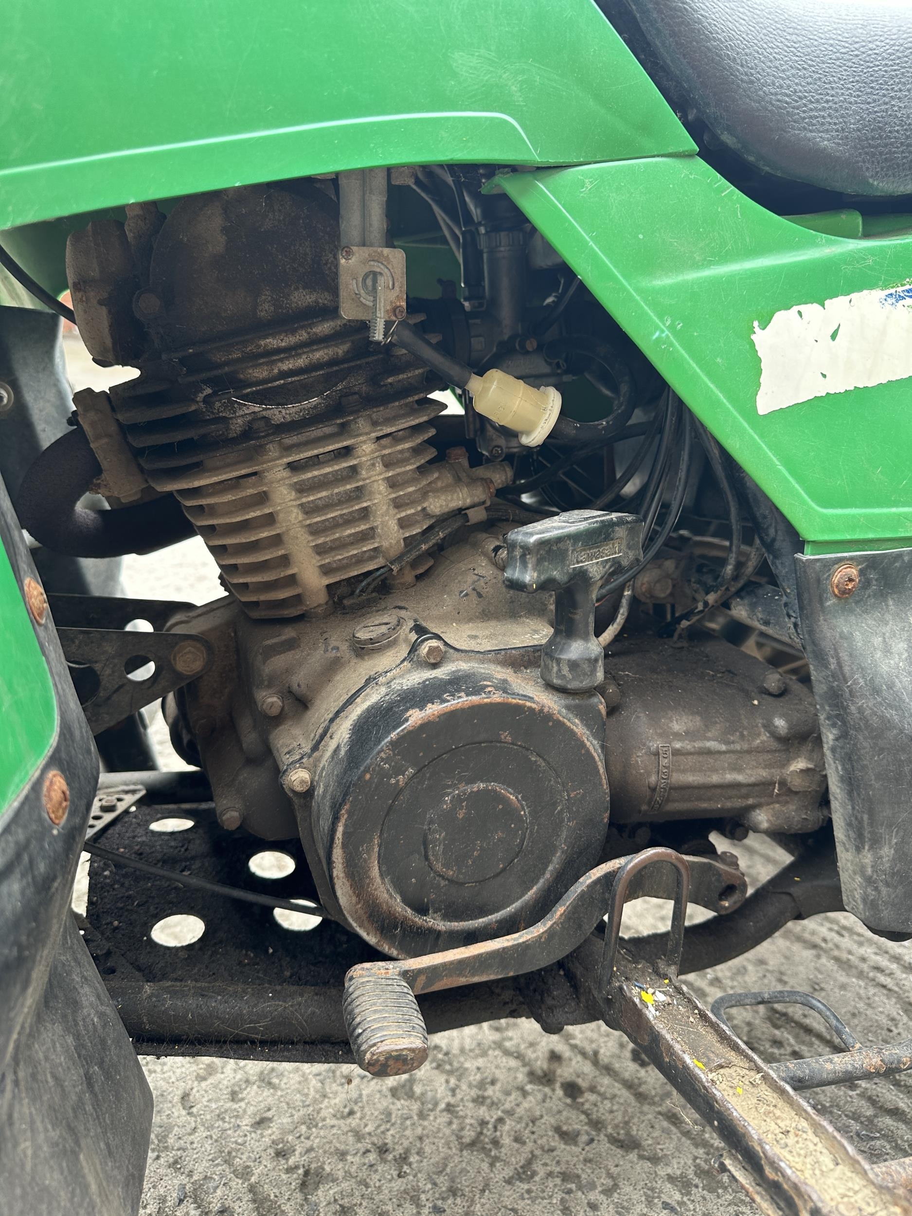 A Kawasaki KLF 220 quad bike