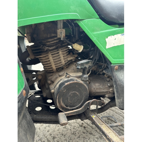 A Kawasaki KLF 220 quad bike