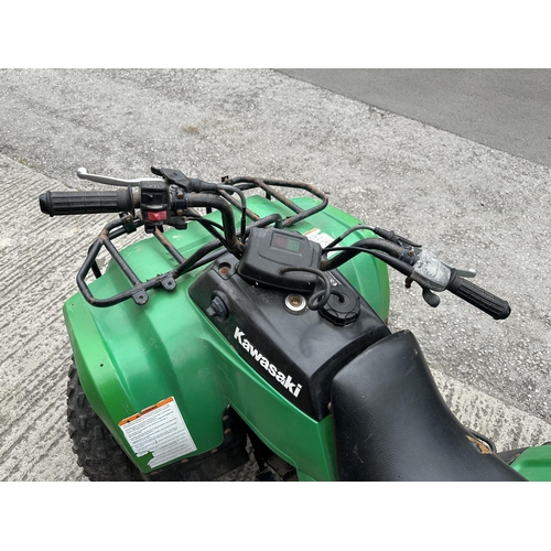 A Kawasaki KLF 220 quad bike
