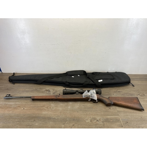 An "Original" model 50 .22 underlever air rifle with Bushnell 3-9x40 ...