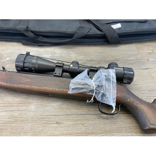 An "Original" model 50 .22 underlever air rifle with Bushnell 3-9x40 ...