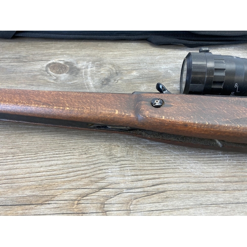 An "Original" model 50 .22 underlever air rifle with Bushnell 3-9x40 ...