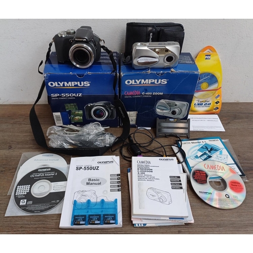 Two boxed Olympus compact digital cameras with software discs, xD ...