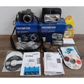 Two boxed Olympus compact digital cameras with software discs, xD ...