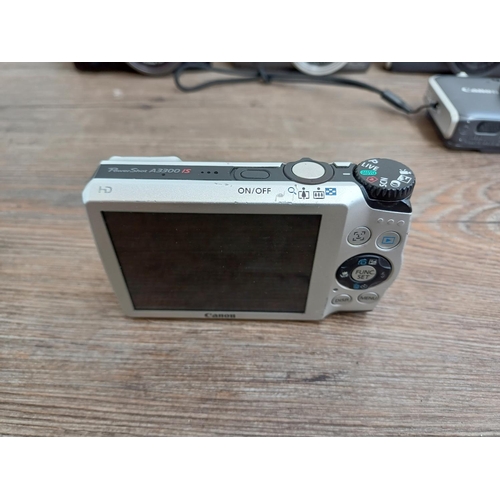 Six Canon PowerShot compact digital cameras, one A3300IS 16mp, one ...