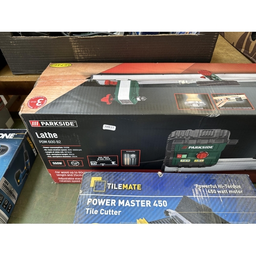 Three items one Parkside PDM600B2 lathe, one boxed Tilemate Power ...