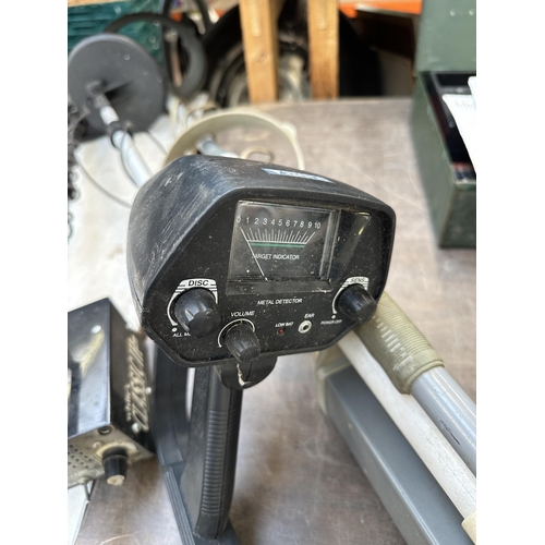 Three metal detectors, one White's Bluemax Deep Scan 950, one Precision ...