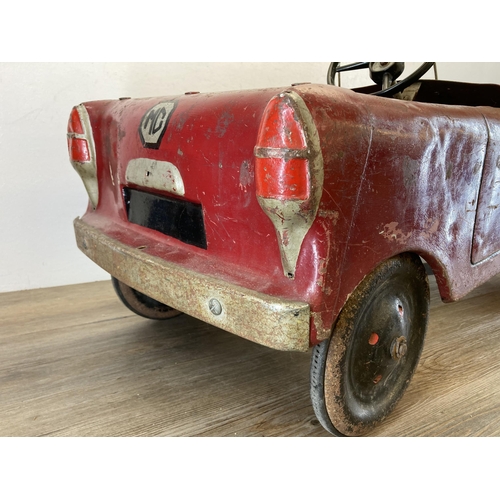 A 1960s Tri-ang MkII Zephyr red painted pedal car - approx. 36cm high x ...