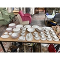A large collection of Johnson Brothers Eternal Bow ceramic dinnerware
