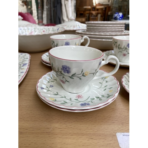 A large collection of Johnson Brothers Eternal Bow ceramic dinnerware