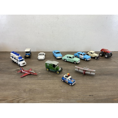 A collection of diecast model vehicles to include Saico 1/32 Ford Anglia, Saico 1/32 Ford Anglia Pol