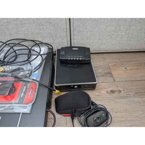 A collection of computing related items to include LG external Super ...