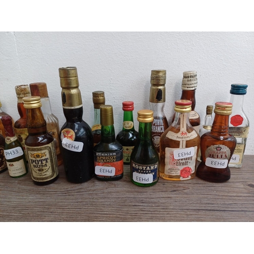 A collection of alcohol miniatures to include Abelour Grant's, Bell's ...