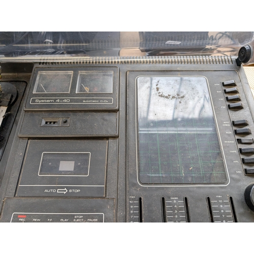 A Fidelity Radio Ltd. S4-40 music centre comprising three-speed BSR ...