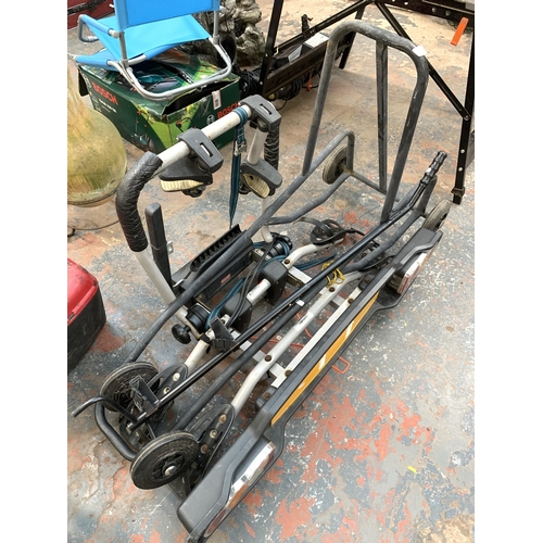 A Witter bicycle car rack with lightboard