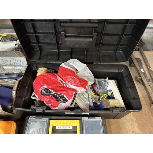 Six tool boxes containing tools to include spanners, chisels ...