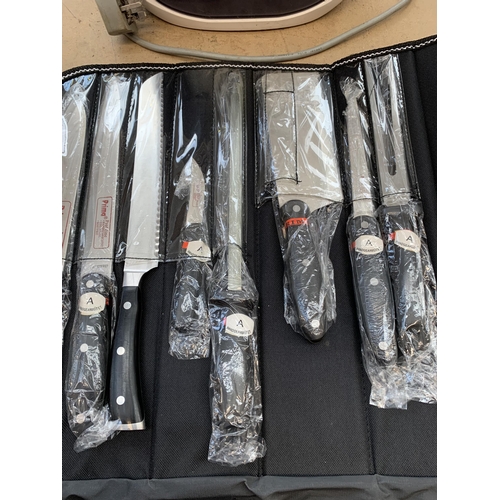 A cased Prima Profiline eight piece chef's knife and carving set