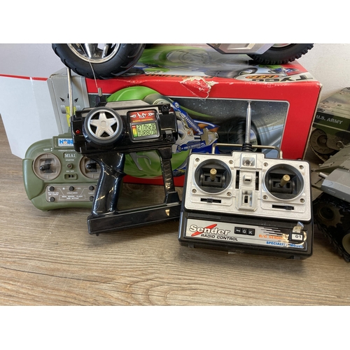 Four remote control vehicles, one Tyco Air Rebound, one Heng Long ...