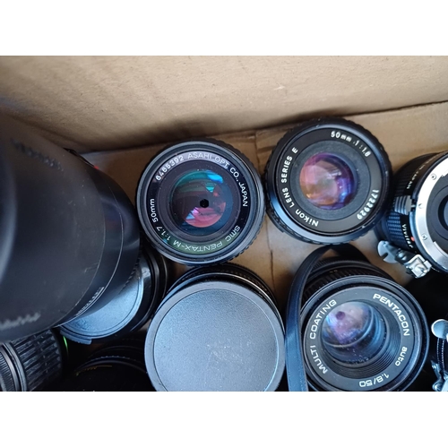 A collection of camera lenses and tele converters to include Pentax-A 1 ...