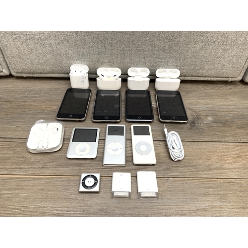 A collection of Apple items to include Airpod pro headphones, Airpod ...