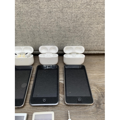 A collection of Apple items to include Airpod pro headphones, Airpod ...