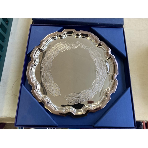 A collection of boxed silver plated salvers