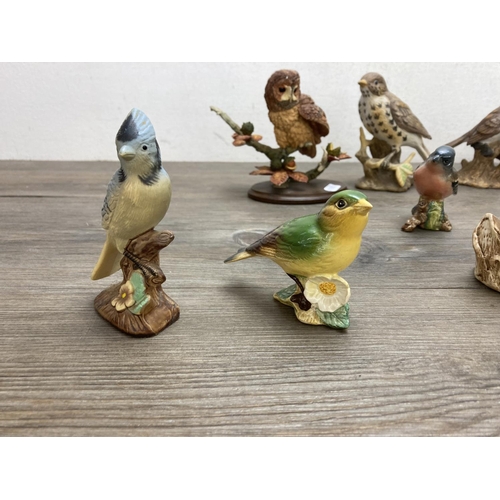 A collection of bird figurines to include Beswick, Bossons, Country ...